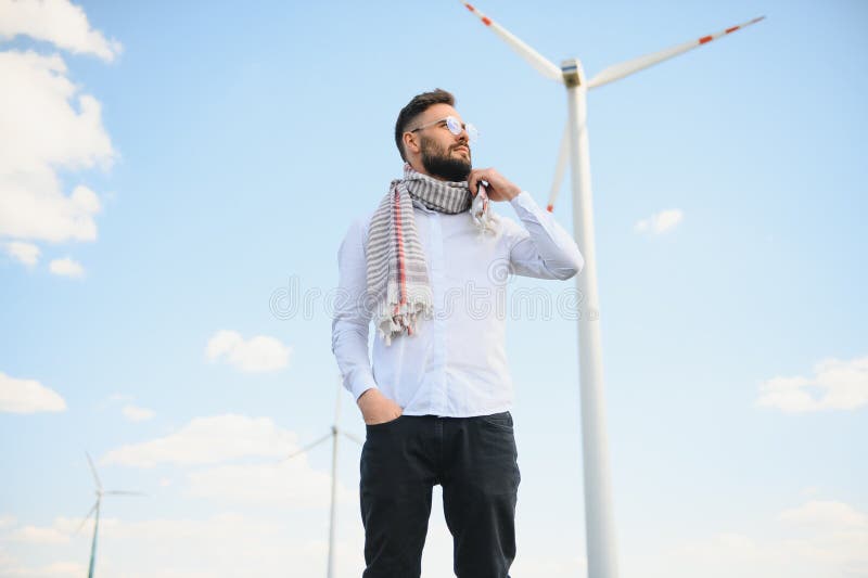 Arab Man Standing with Wind Turbine on Mountain Stock Photo - Image of ...