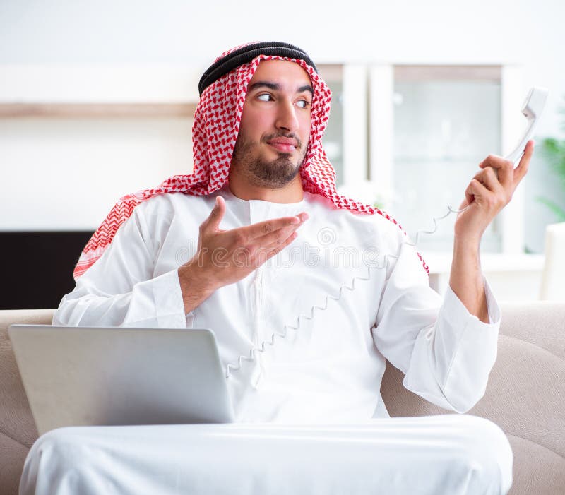 Arab Man Working at Home on His Work Stock Photo - Image of islamic ...