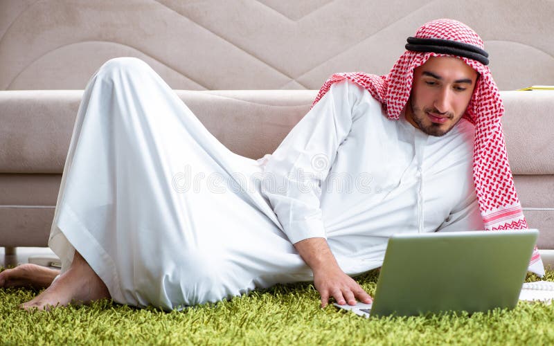 Arab Man Working at Home on His Work Stock Photo - Image of emirates ...