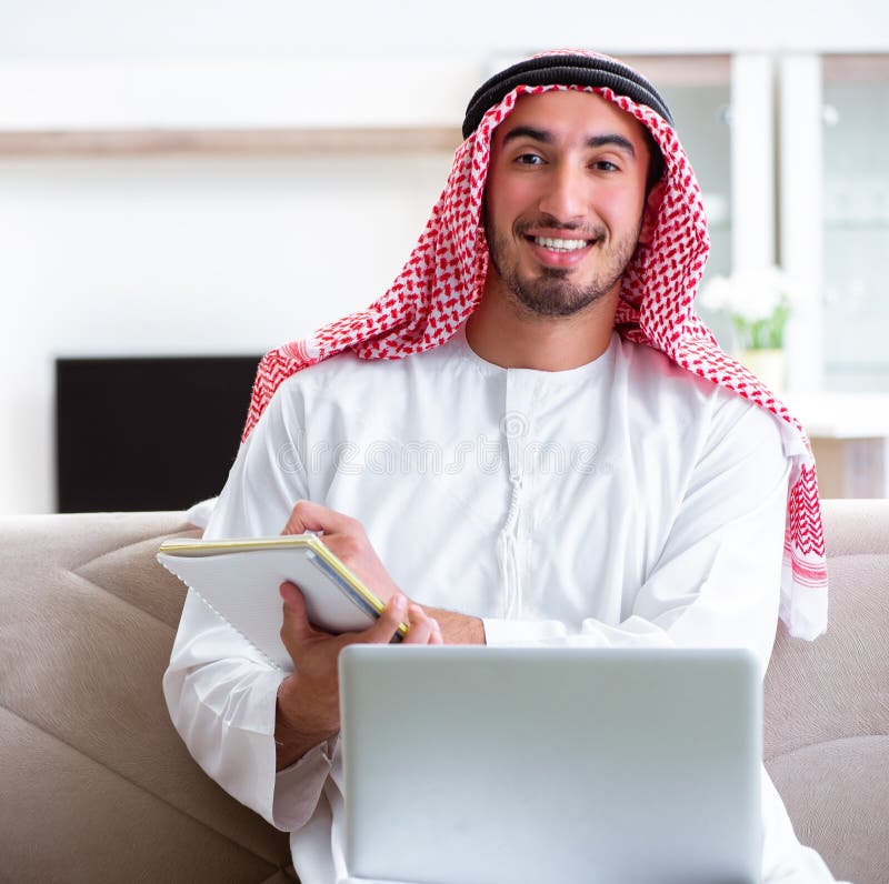Arab Man Working at Home on His Work Stock Photo - Image of emirates ...