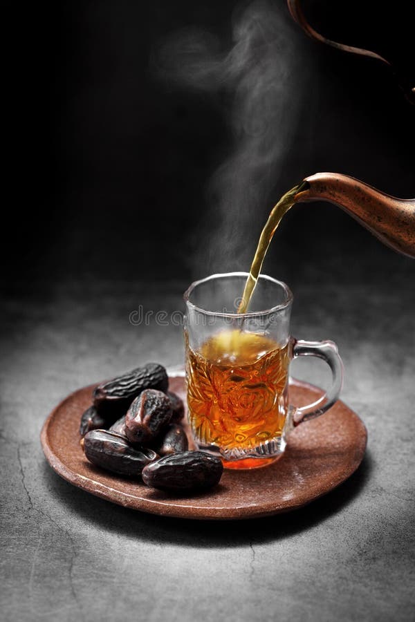 Arab Tea and Dates Fruit on a Concrete Background Stock Photo - Image ...