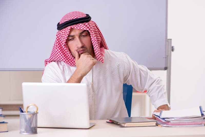 The Arab Teacher in Front of Whiteboard Stock Photo - Image of emirates ...