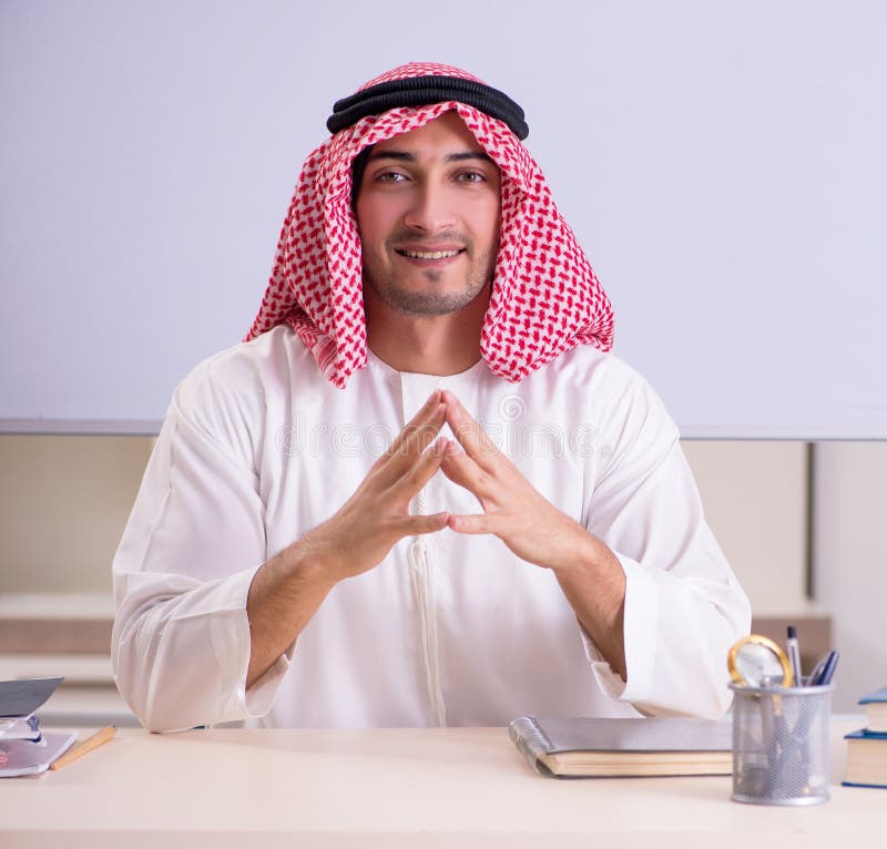 Arab Teacher in Front of Whiteboard Stock Photo - Image of arabic ...
