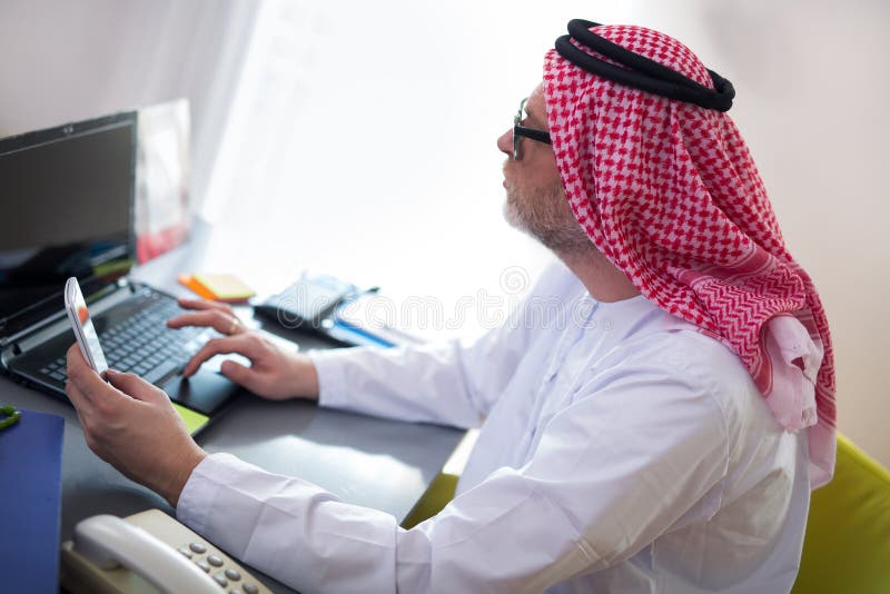 Arabic Man Office Worker Sitting His Desk Stock Photos - Free & Royalty ...