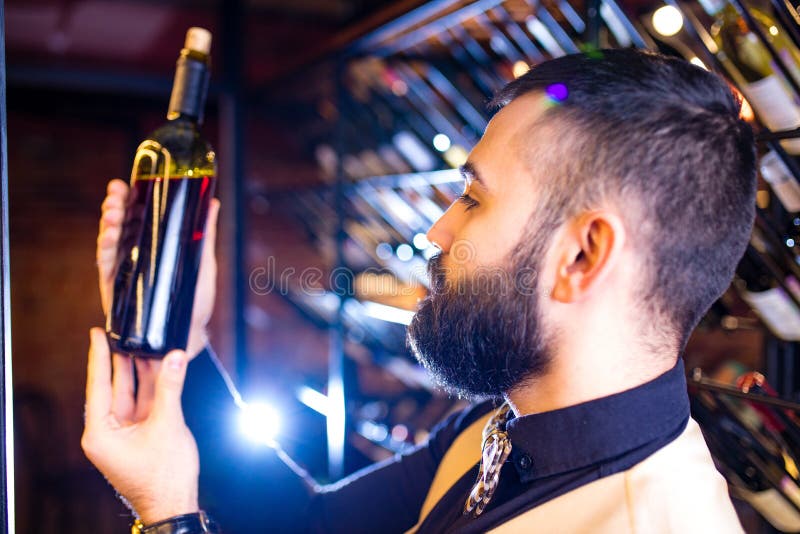 Arabian Man Sommelier Appreciating Drink in Lux Hotel Stock Image ...