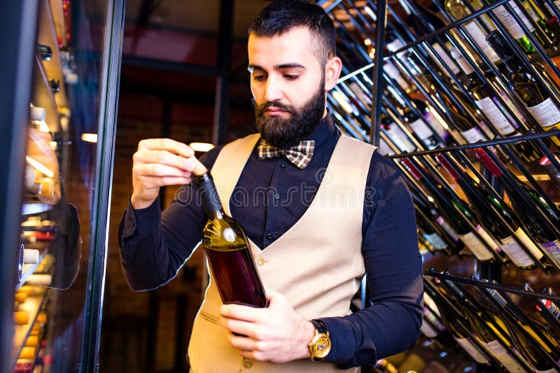 Arabian Man Sommelier Appreciating Drink in Lux Hotel Stock Photo ...