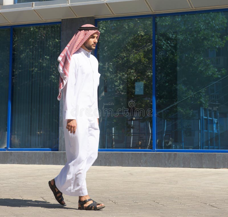 Arabian Man Walking Along the Street Stock Image - Image of arabic ...