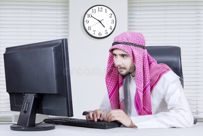 Arabian Man Working with Computer Stock Photo - Image of middle ...