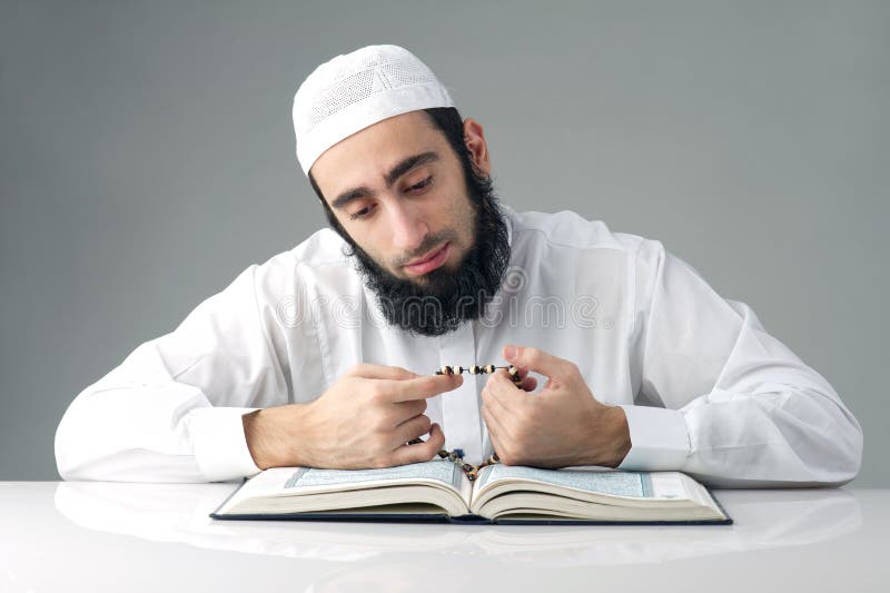 Man Reading Quran