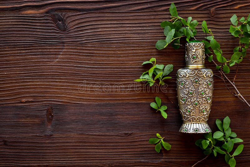 Arabian Oud Perfume or Oil with Agar Wood Tree Stock Image - Image of ...