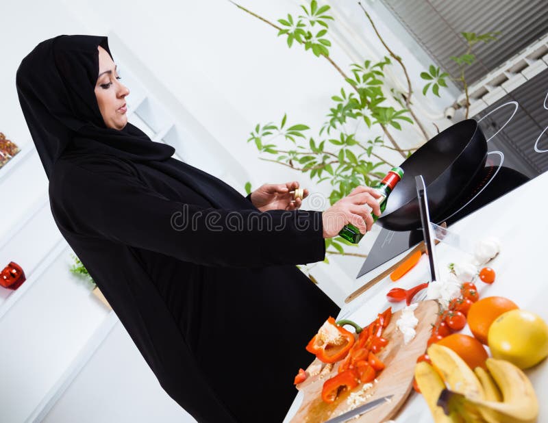 Arabian woman cooking stock image. Image of girl, chef - 41326537