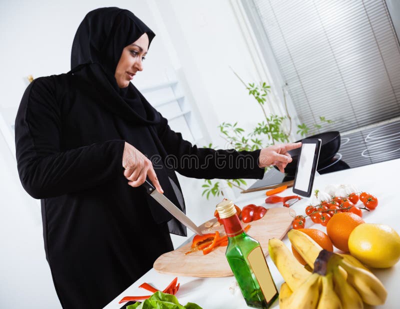 Arabian Woman Cooking in the Kitchen Stock Photo - Image of eastern ...