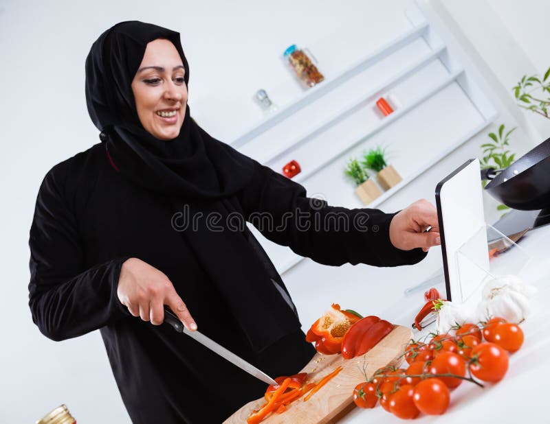 Arabian Woman Cooking in the Kitchen Stock Photo - Image of housewife ...