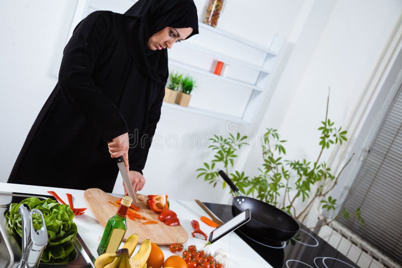 Arabian Woman Cooking in the Kitchen Stock Image - Image of cook, dubai ...