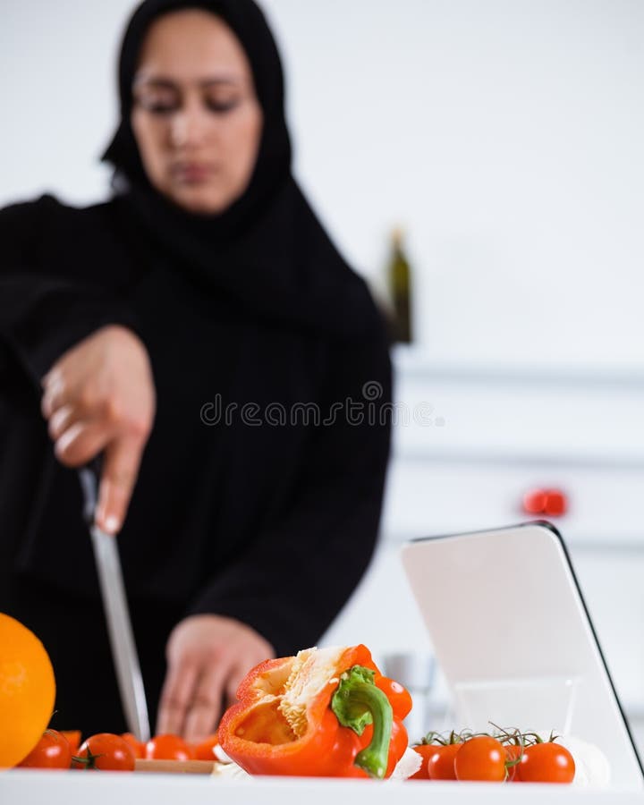 Arabian Woman Cooking in the Kitchen Stock Image - Image of islam ...