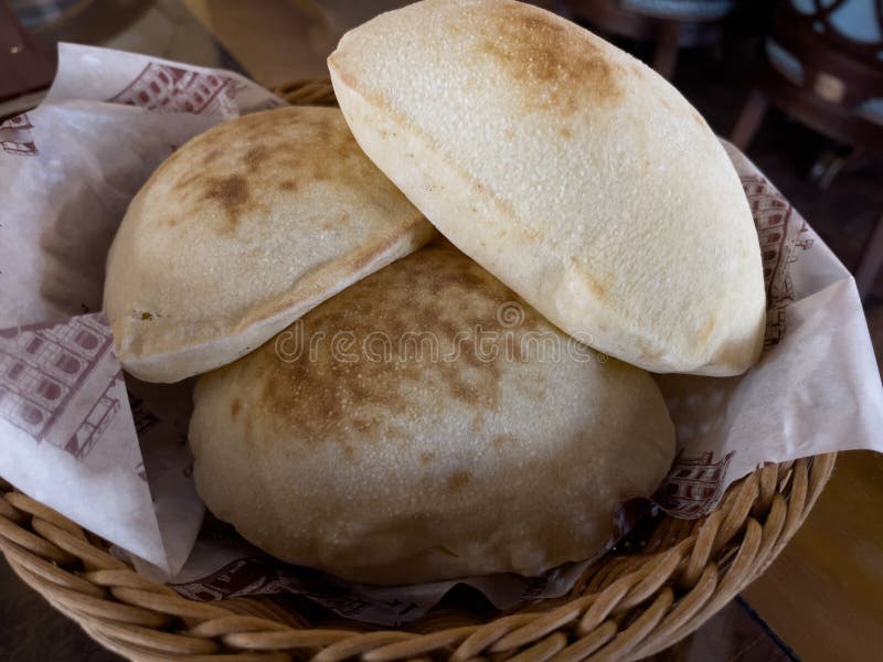Arabic Bread Served in a Basket Stock Photo - Image of layered, baked ...