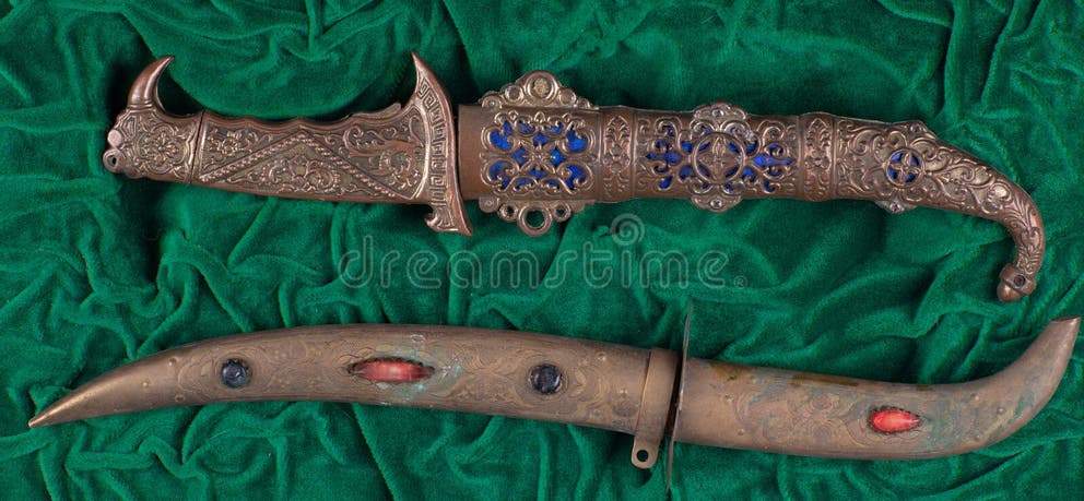 Arabic dagger on green stock image. Image of metal, antique - 295704109