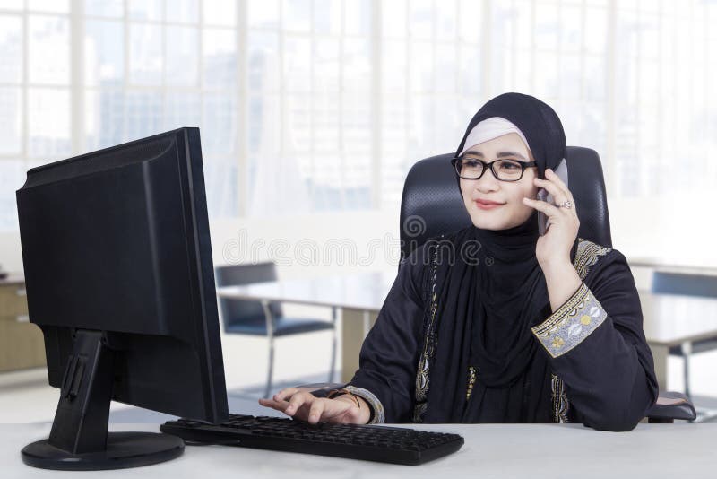Arabic Female Worker Works in Office Stock Photo - Image of islam ...