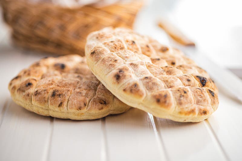 Arabic Flat Pita Bread on White Table Stock Image - Image of baked ...