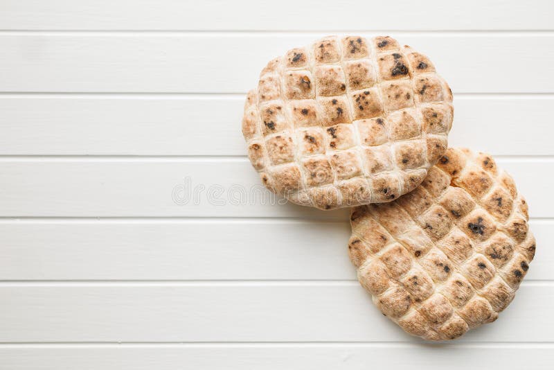 Arabic Flat Pita Bread on White Table. Top View Stock Image - Image of ...