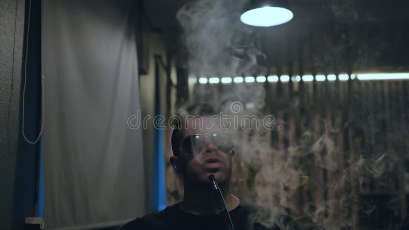 Arabic Jordanian Young Man Smokes a Hookah. Stock Video - Video of ...