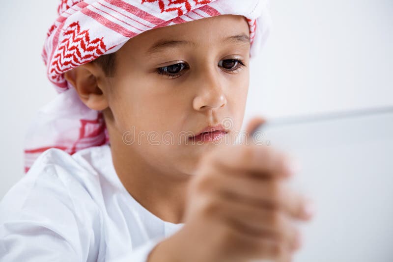 Arabic Little Boy Using Tablet Stock Image - Image of playing, culture ...