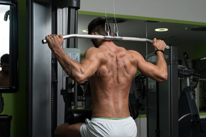 Arabic Man Doing Heavy Weight Exercise for Back Stock Photo - Image of ...