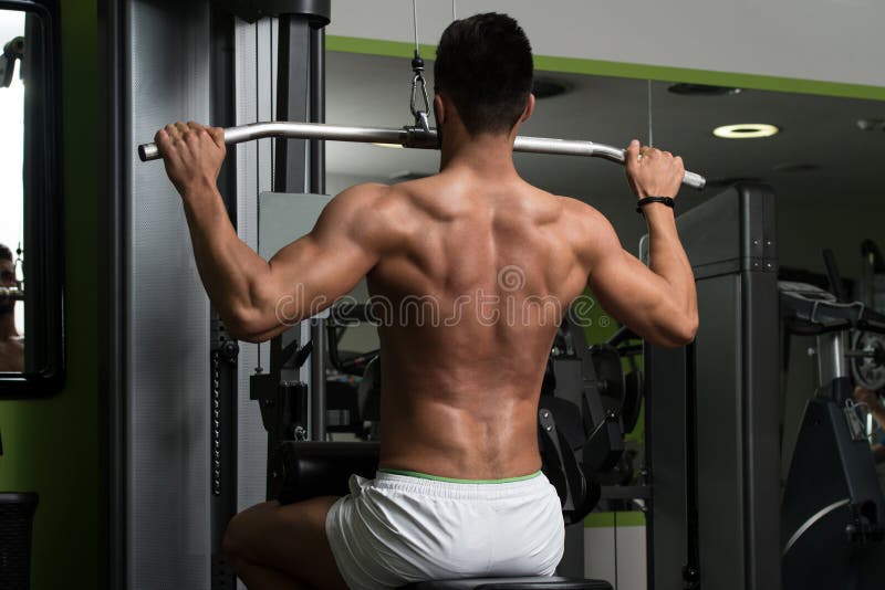Arabic Man Doing Heavy Weight Exercise for Back Stock Image - Image of ...