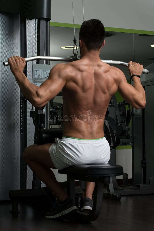 Arabic Man Doing Heavy Weight Exercise for Back Stock Photo - Image of ...