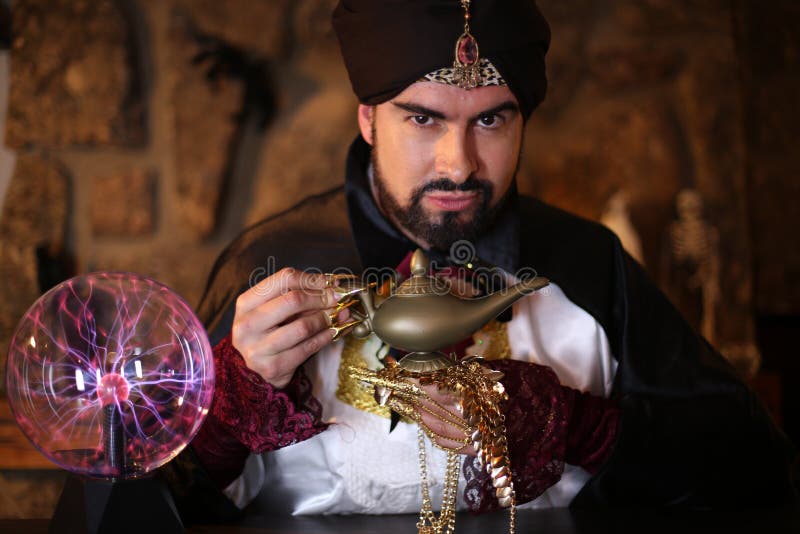 Arabic Man Holding Gold Lamp Stock Photo - Image of arabia, fairy ...