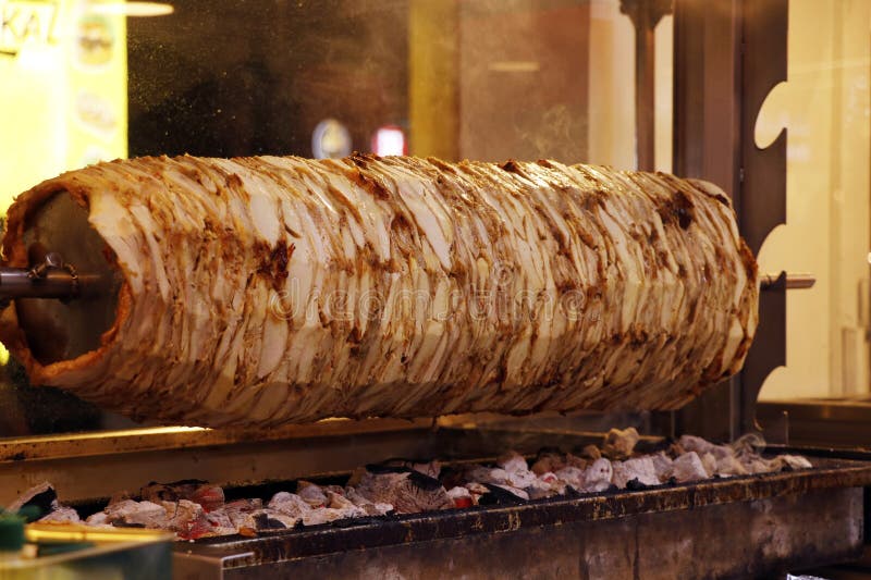 Arabic Middle Eastern Street Food Shawarma Rolling on Top of Fire Grill ...