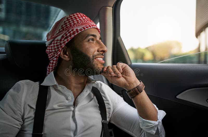 Arabic Muslim Businessman Driving a Car Wearing a Keffiyeh Stock Photo ... Arabic Muslim Businessman Driving a Car Wearing a Keffiyeh Stock Photo ...