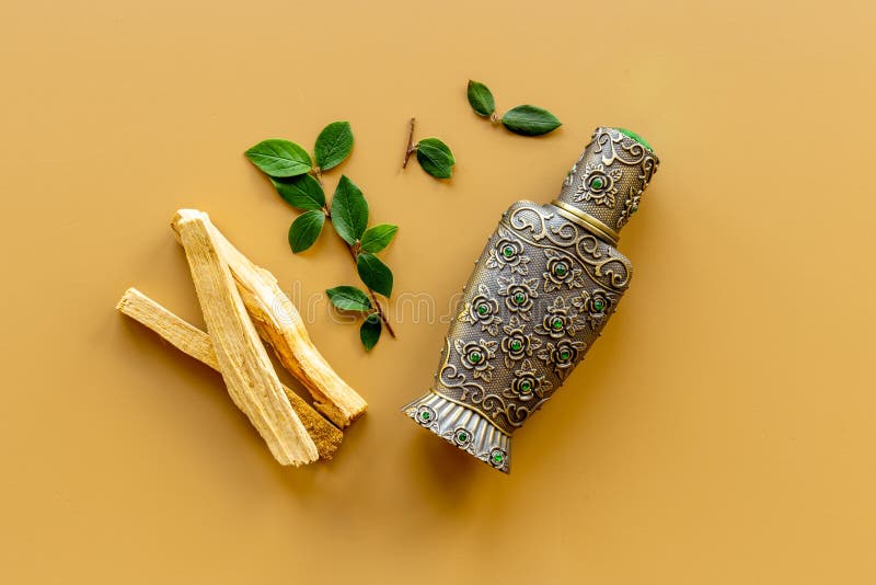Arabic Oud Oil Perfume in Silver Bottle with Crystals and Sticks of ...