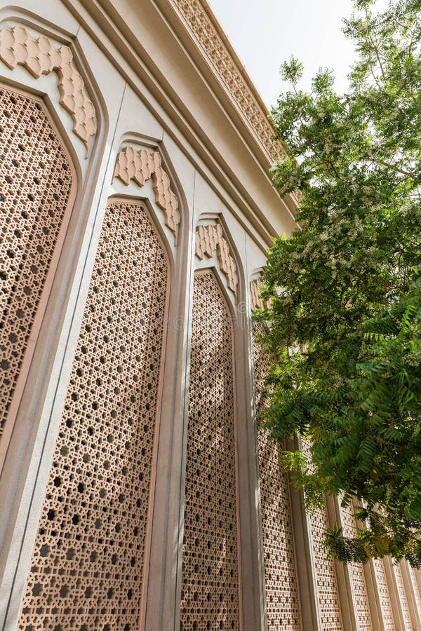Arabic Pattern Wall of the Building with Tree at Dubai Stock Photo ...