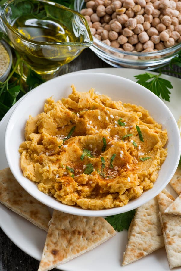 Arabic Sauce Hummus with Flatbread, Vertical, Top View Stock Image ...