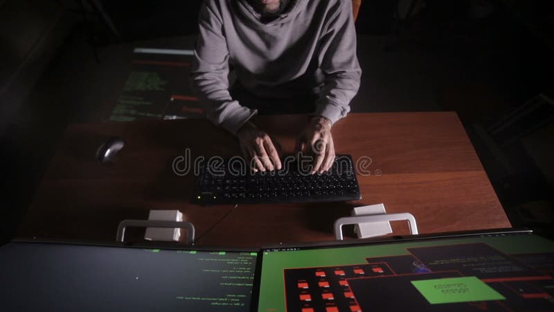 Arabic it Specialist Working on Computer at Night. Hacker Breaking ...