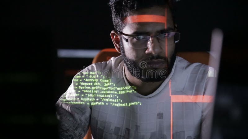 Arabic it Specialist Working on Computer at Night. Hacker Breaking ...