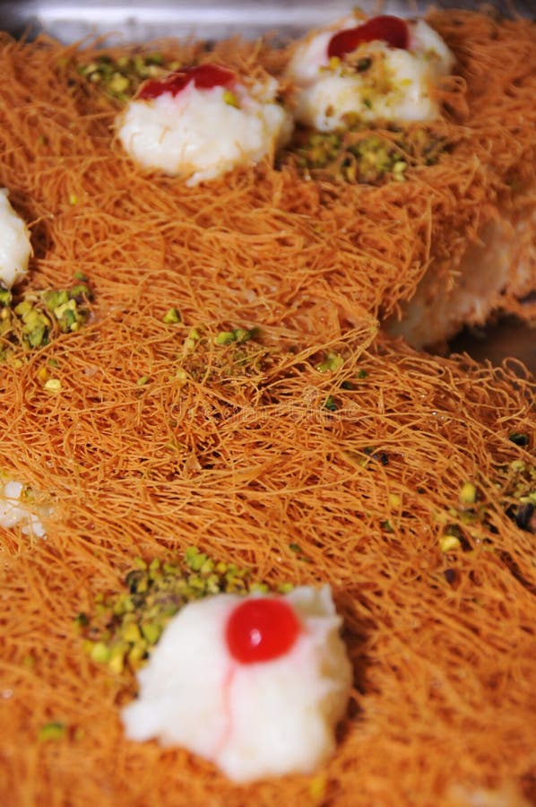 Arabic Sweet Kunafa with Cheese and Nuts Stock Image - Image of cheese ...