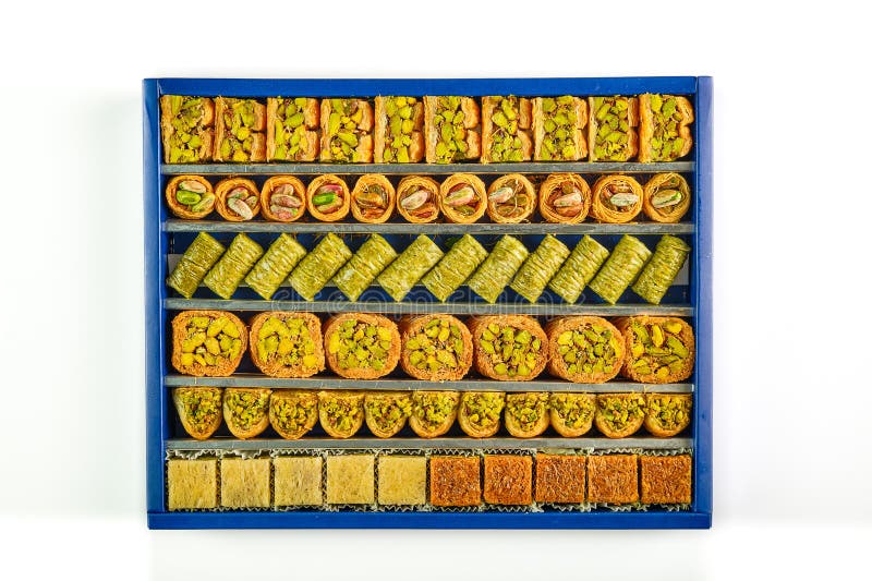 A Box of Assorted Arabic Sweets with Pistachios Stock Photo - Image of ...