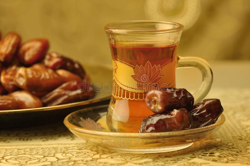 Arabic tea cup and dates stock image. Image of ingredient - 20567355