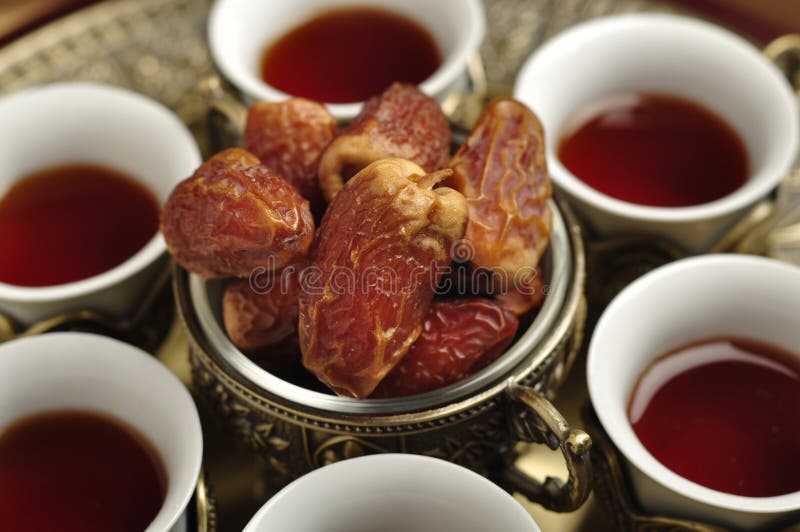 Arabic tea and dates. stock photo. Image of guest, fruit - 55428228