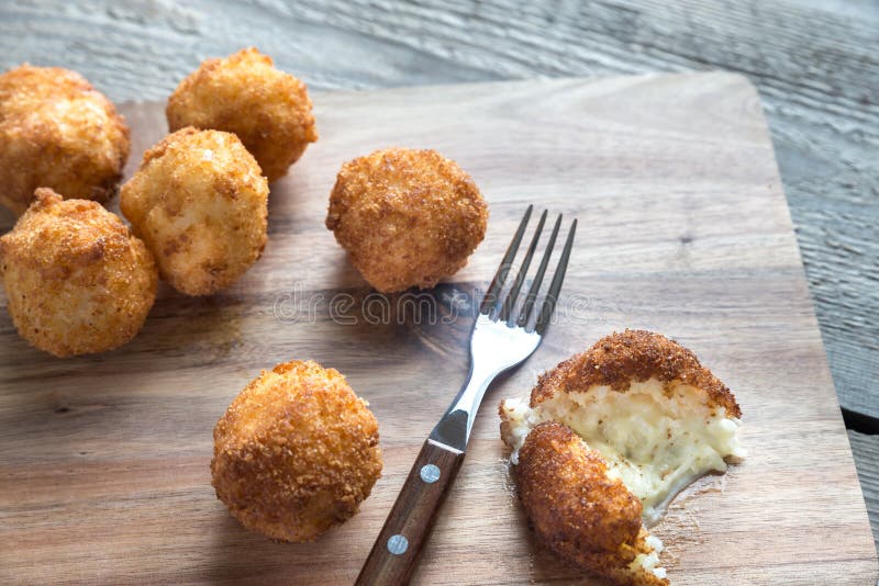 Arancini - Rice Balls with Mozzarella Stock Photo - Image of fork ...