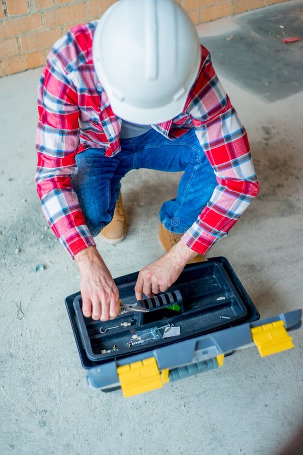 Arbeitskraft Auf Einem Consruction Standort Stockfoto - Bild von person ...