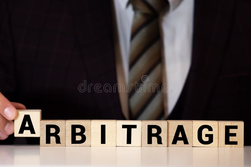 ARBITRAGE Word Made with Building Blocks Stock Photo - Image of board ...