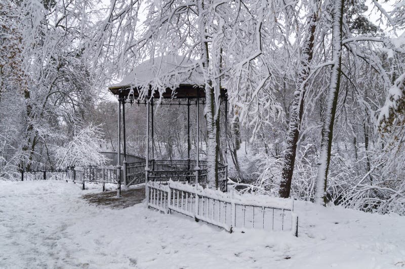 Arbor in the snowy park stock photo. Image of house, forest - 80908064