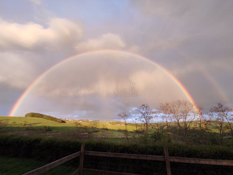A pretty rainbow stock photo. Image of rainbow, colors - 220823706