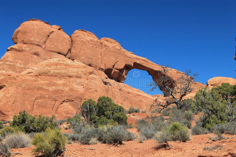 Arc Rock Formation Under Blue Clouds during Daytime Stock Image - Image ...