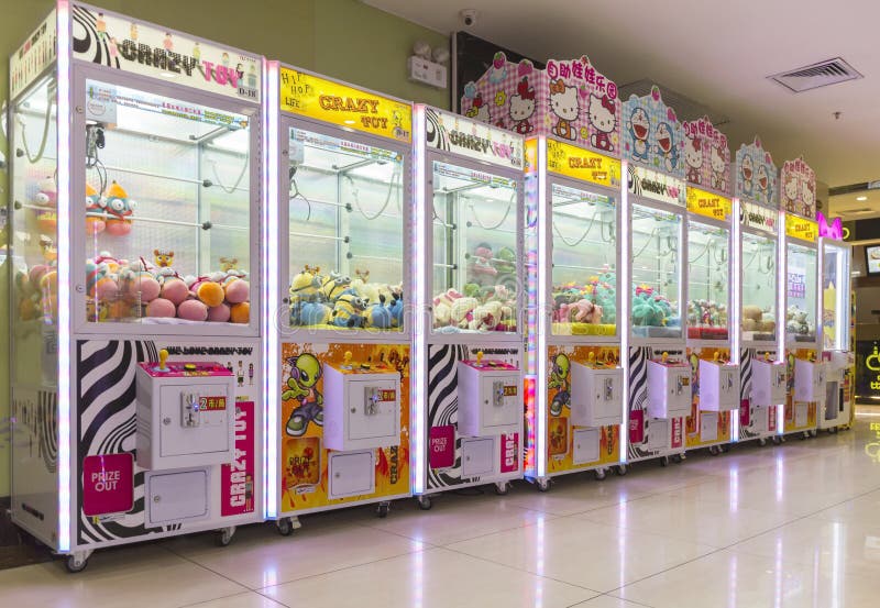Arcade Claw Machine Toys Crane Game Editorial Photography - Image of ...