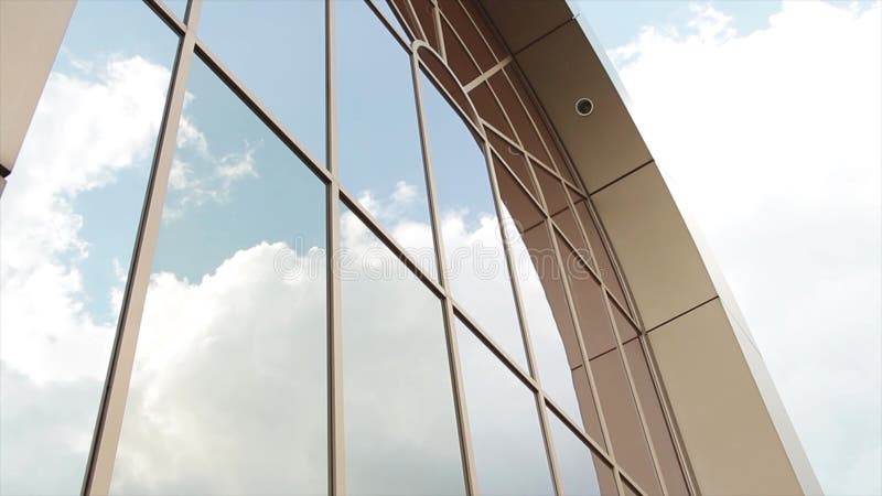 Arch Arc Windows on Beige Mall Storefront with Reflection of Clouds ...