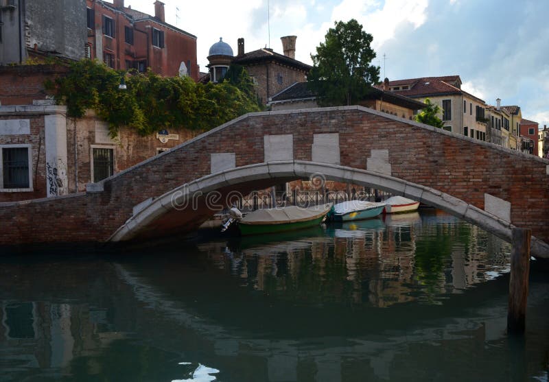 Arch Bridge and Foot Path Over a Canal Stock Photo - Image of bridge ...